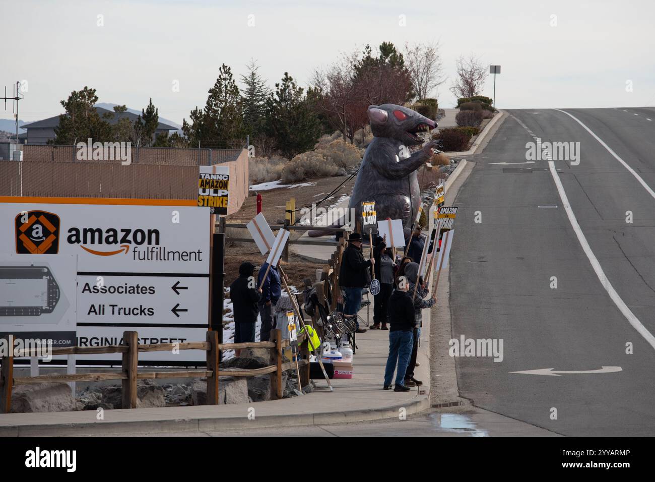 Workers strike outside of an Amazon building in Northern Reno, Nevada ...