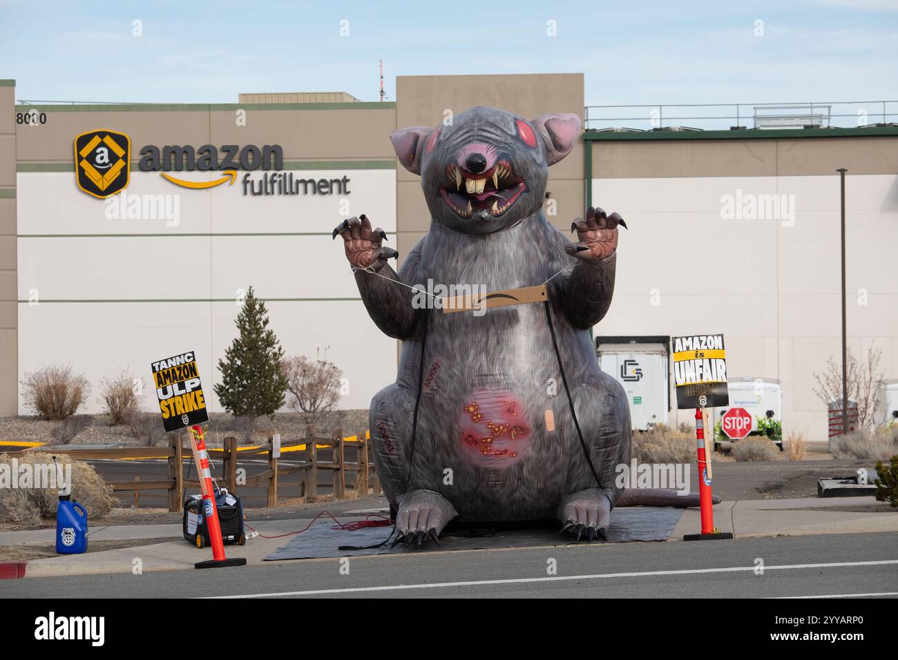 Workers strike outside of an Amazon building in Northern Reno, Nevada ...