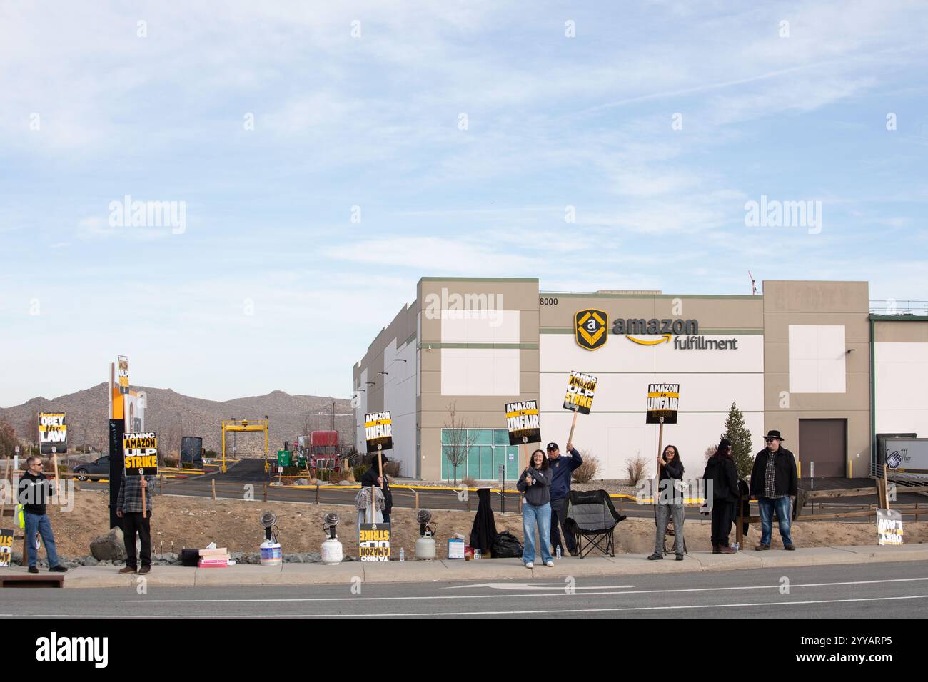 Workers strike outside of an Amazon building in Northern Reno, Nevada ...