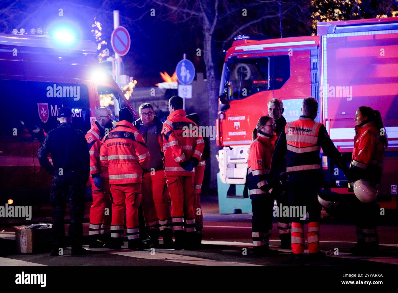 Emergency services work in a cordoned-off area near a Christmas Market ...