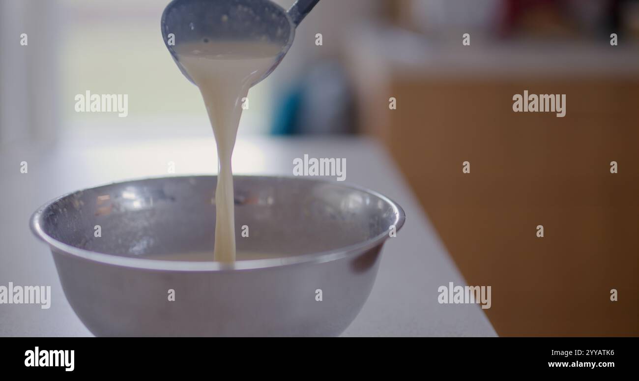 Pouring pancake batter hi-res stock photography and images - Alamy