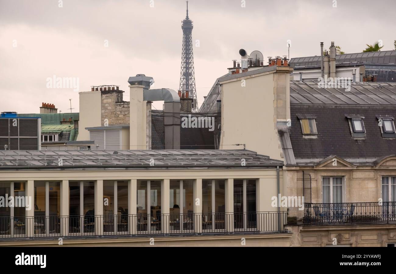 Rooftops eiffel tower paris france french buildings windows arch hi-res stock photography and ...