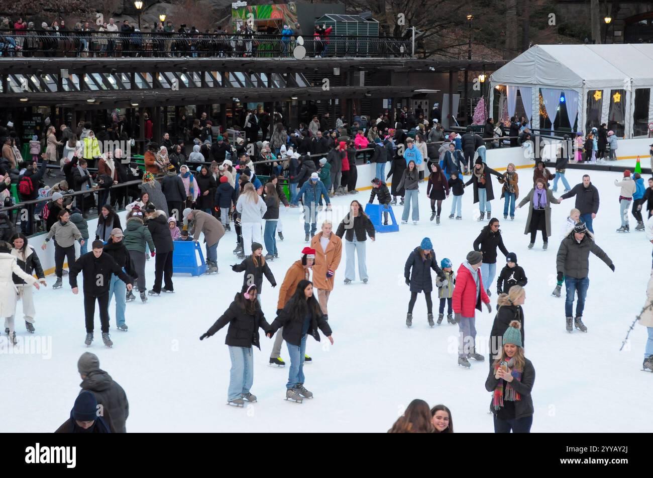 People ice skate in Wollman Rink in Central Park, Manhattan, New York ...