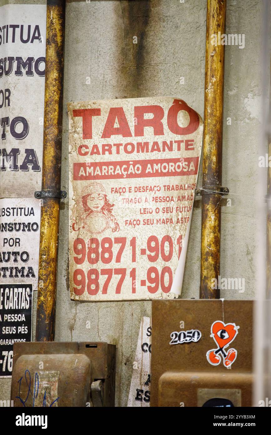 wall with poster in the lambe lambe style in Rio de Janeiro, Brazil ...