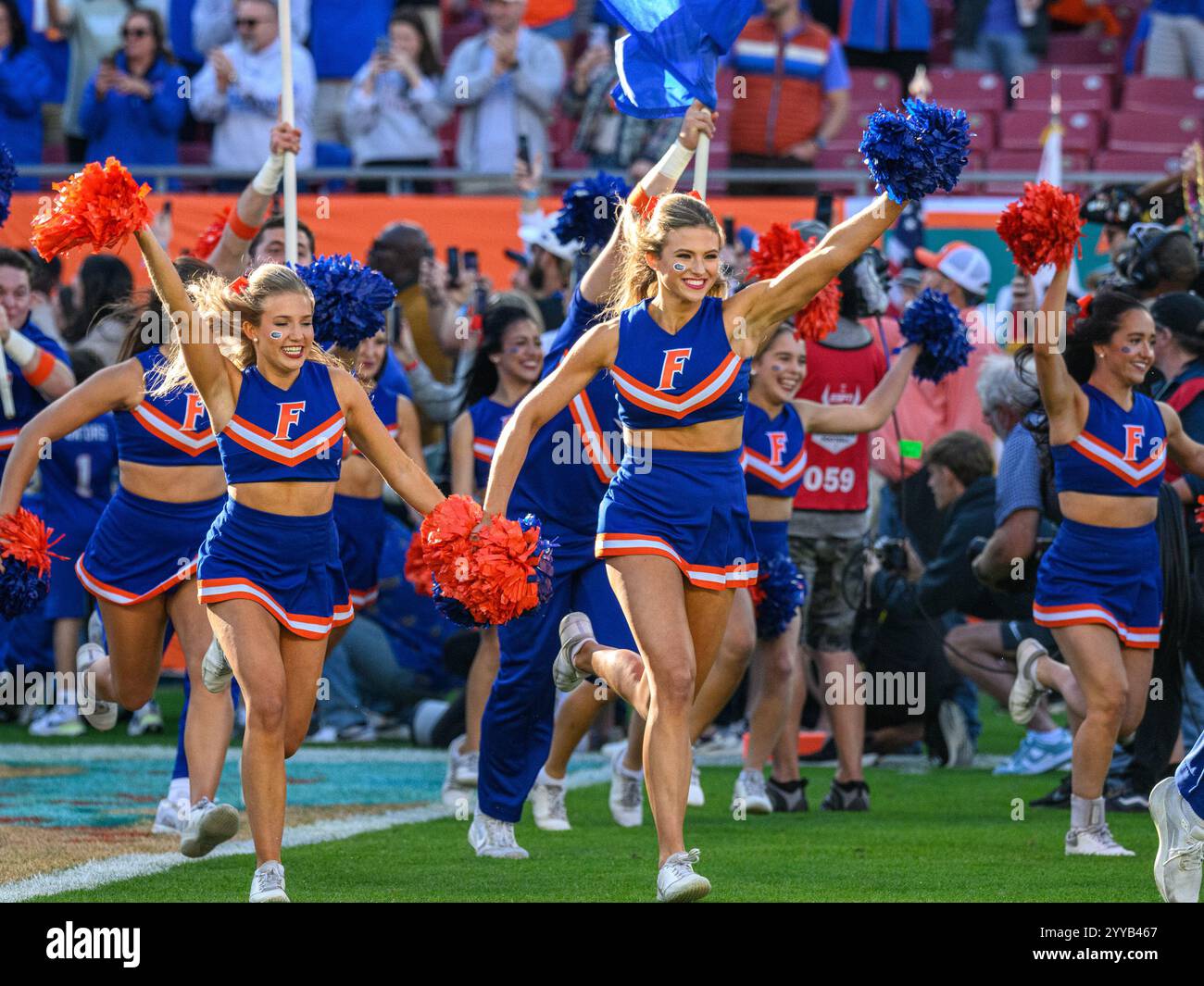 Tampa, FL, USA. 20th Dec, 2024. Florida Gators cheer lead the team out ...