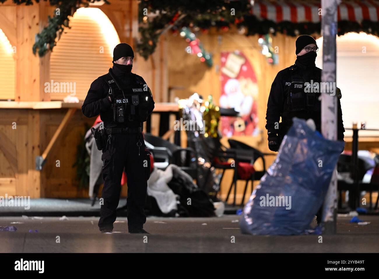 Magdeburg, Germany. 21st Dec, 2024. The police are on duty at the ...
