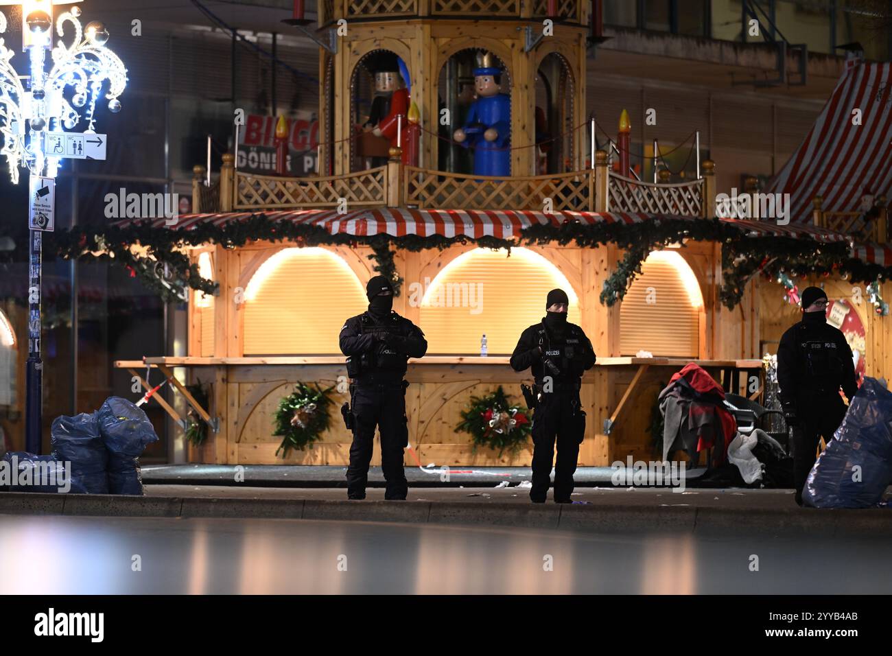 Magdeburg, Germany. 21st Dec, 2024. The police are on duty at the ...