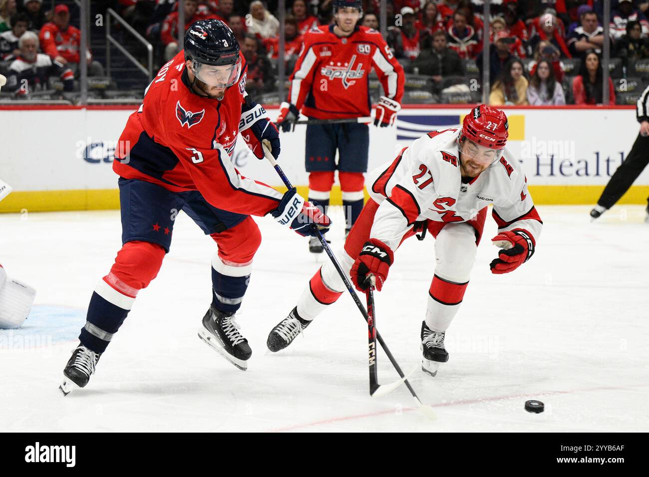 Washington Capitals defenseman Matt Roy (3) and Carolina Hurricanes ...