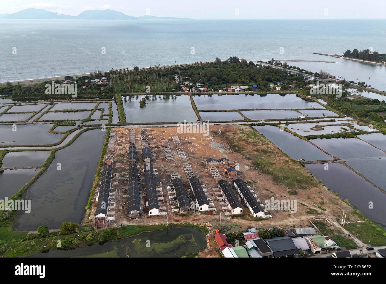 A housing complex is seen under construction near the waterfront area ...