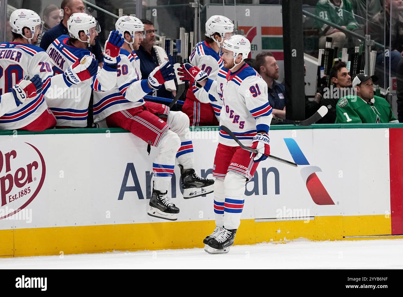 New York Rangers right wing Reilly Smith (91) celebrates with the bench ...