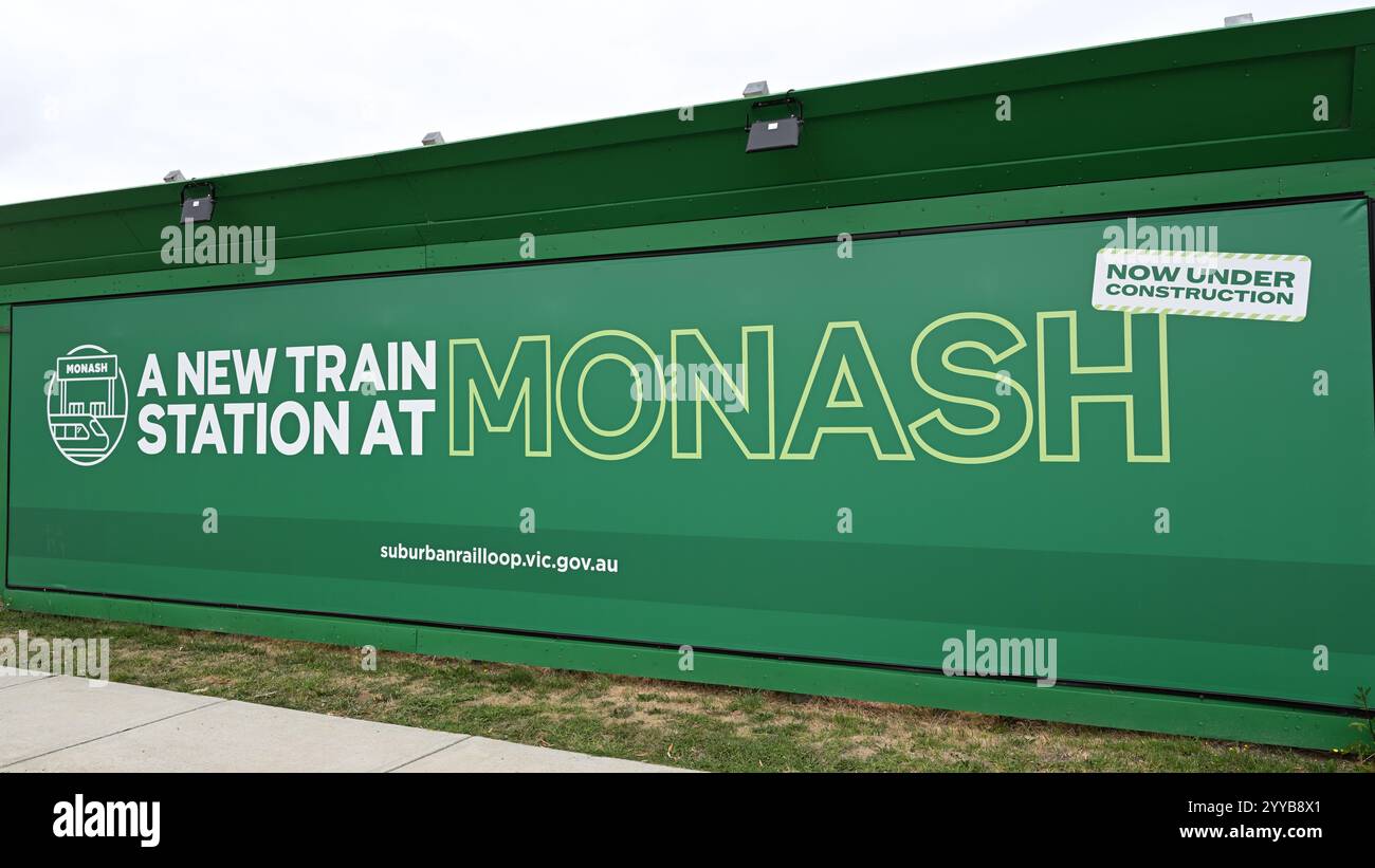Sign promoting a new train station at Monash University, as part of the ...