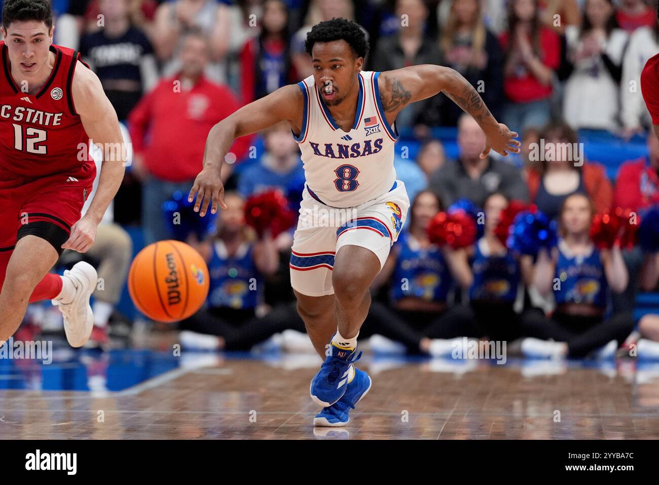 Kansas guard David Coit drives during the second half of an NCAA ...