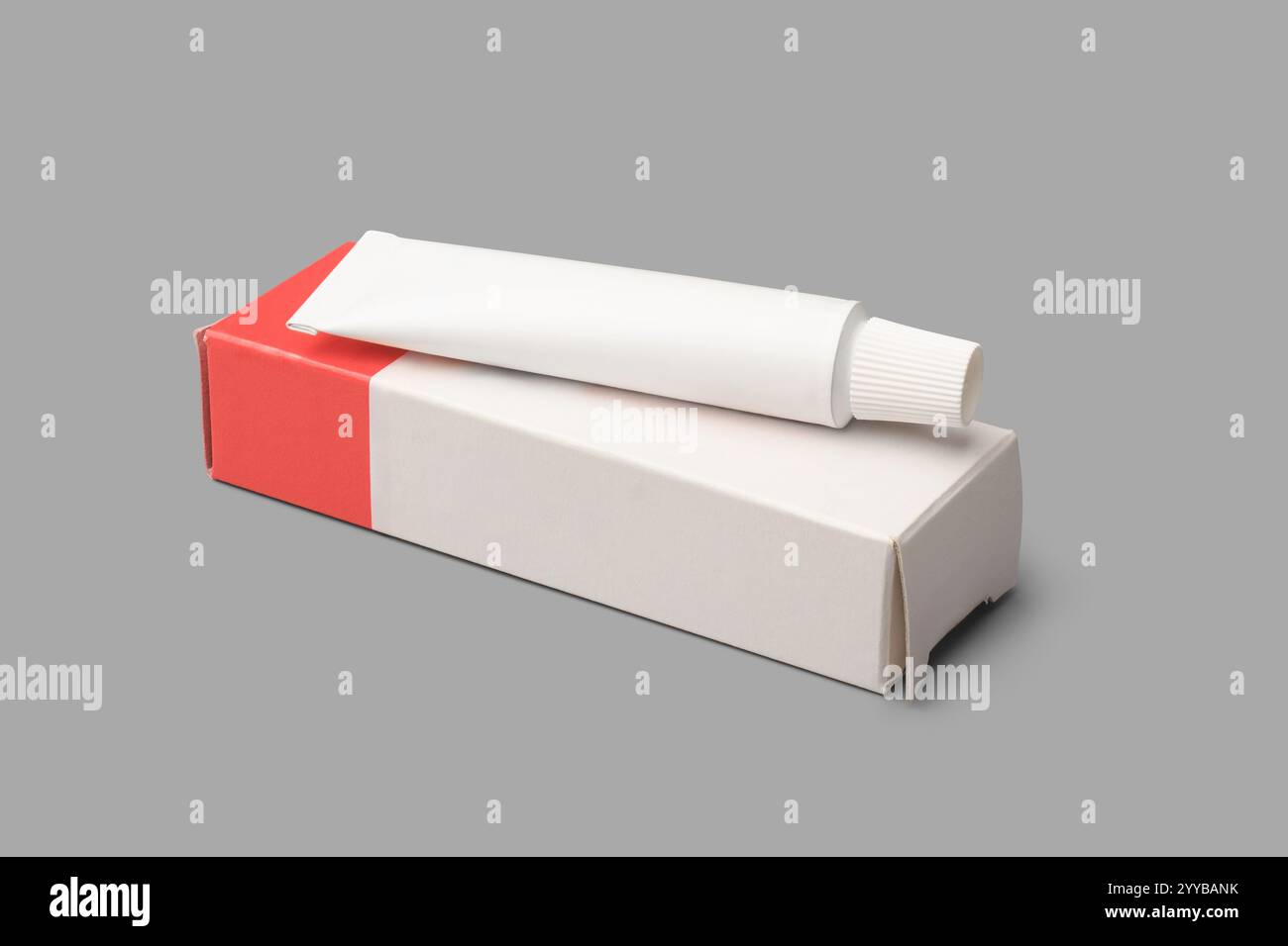 small white tube on cardboard box isolated gray background, mockup ...