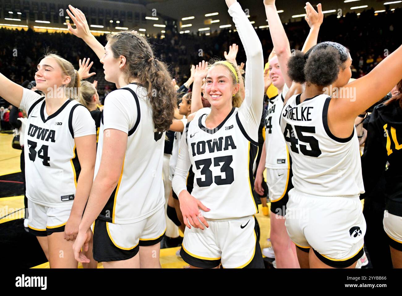 IOWA CITY, IA - DECEMBER 20: Iowa players wave to the crowd after ...