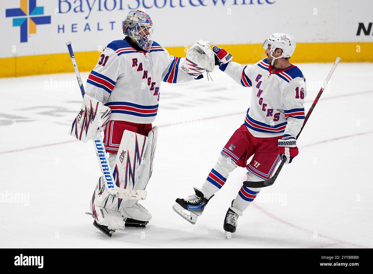New York Rangers' Igor Shesterkin (31) and Vincent Trocheck (16 ...