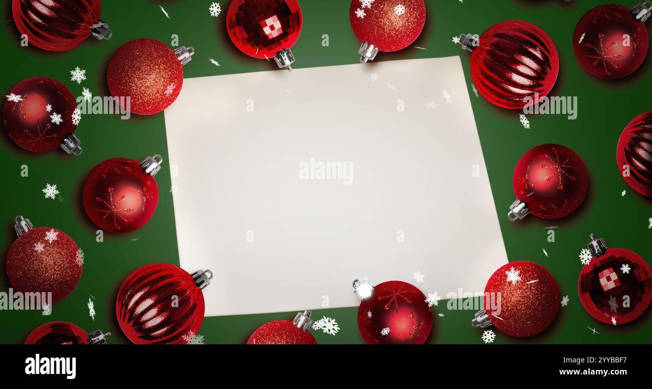Image of snow falling over white card with copy space and christmas ...