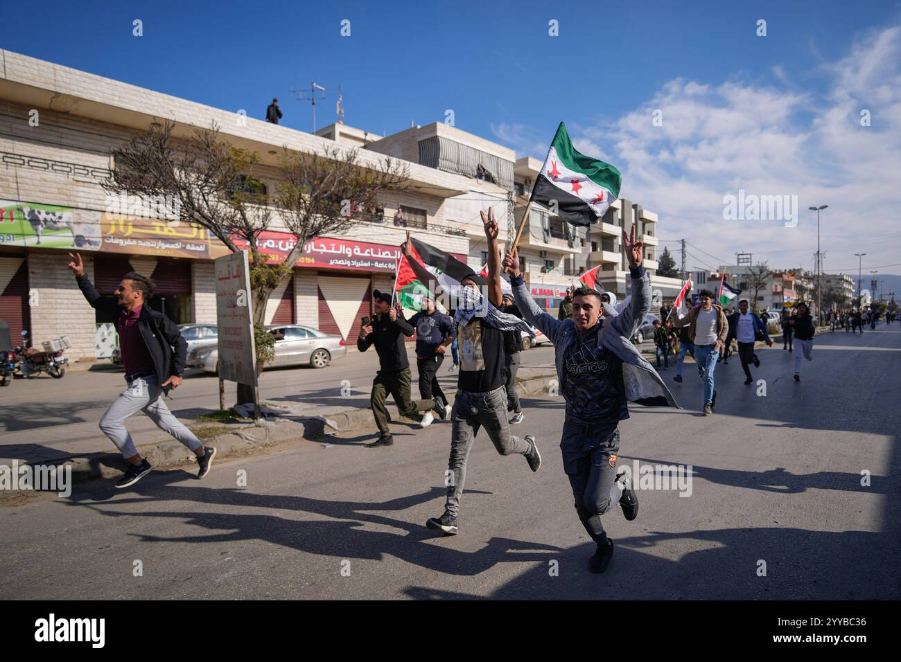 FILE - Syrians celebrate the fall of Bashar Assad's government in the ...