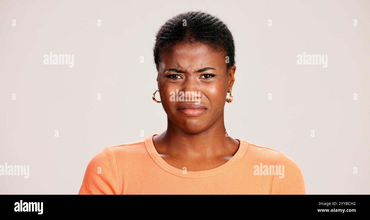 Black woman, portrait and expression in studio for disgust, disapproval ...