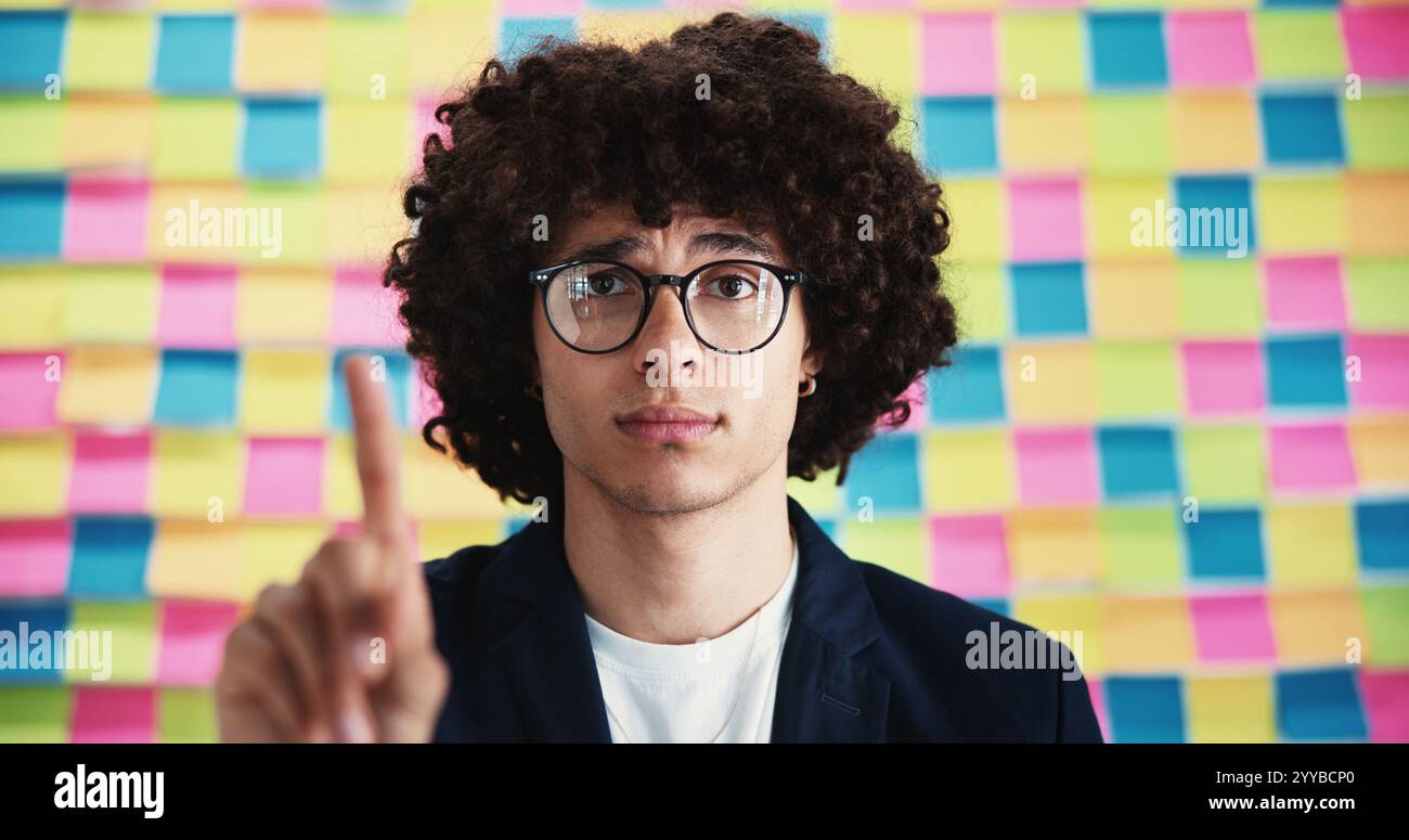 Man, glasses and confused in office for question, advice and project ...