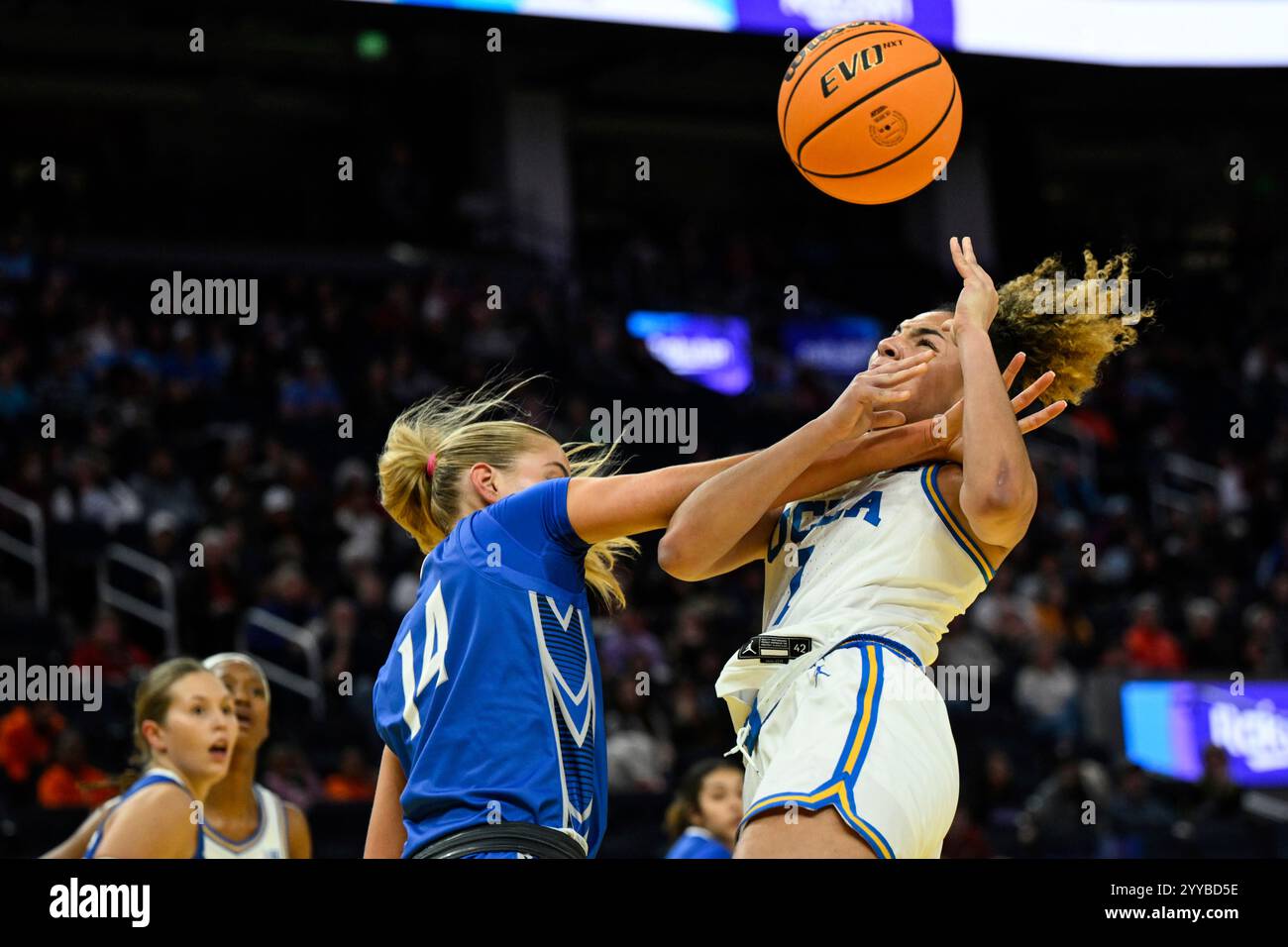 Creighton forward Mallory Brake (14) blocks a layup-attempt by UCLA ...