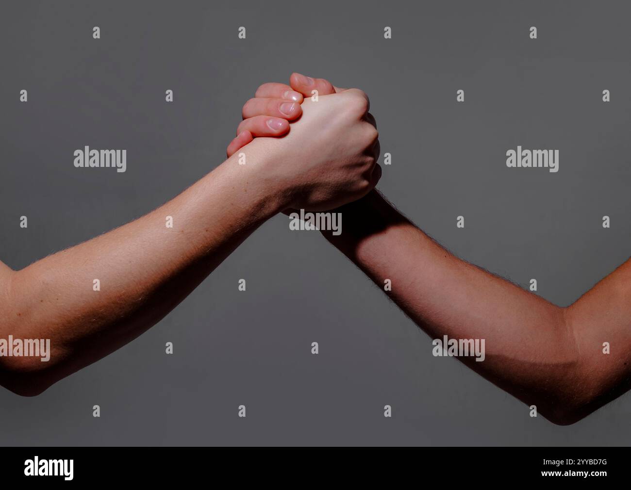 Handshake, arms, friendship. Friendly handshake, friends greeting, teamwork friendship. Rescue ...