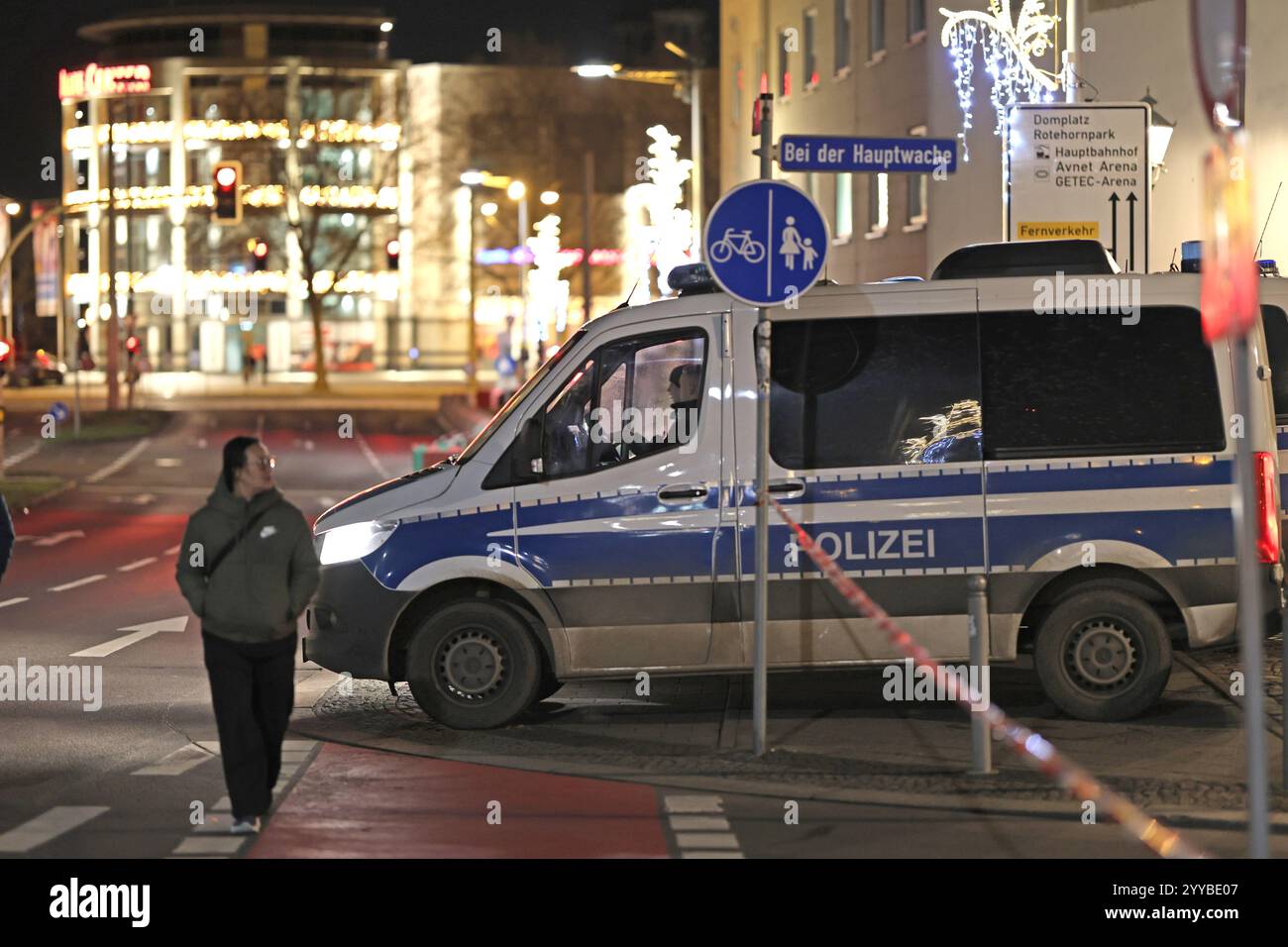 Magdeburg, Germany. 21st Dec, 2024. Police emergency vehicles in front ...
