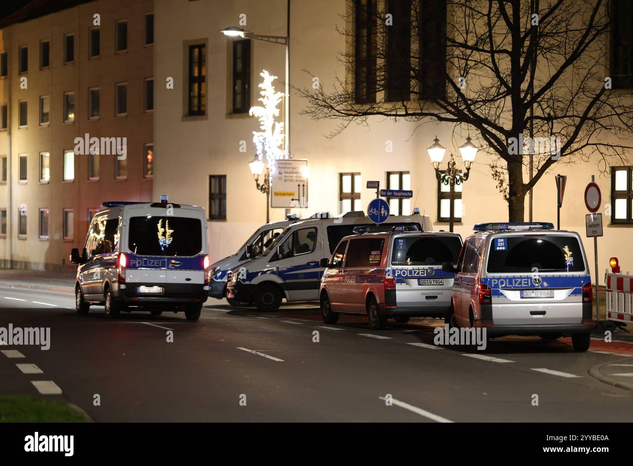 Magdeburg, Germany. 21st Dec, 2024. Police emergency vehicles in front ...
