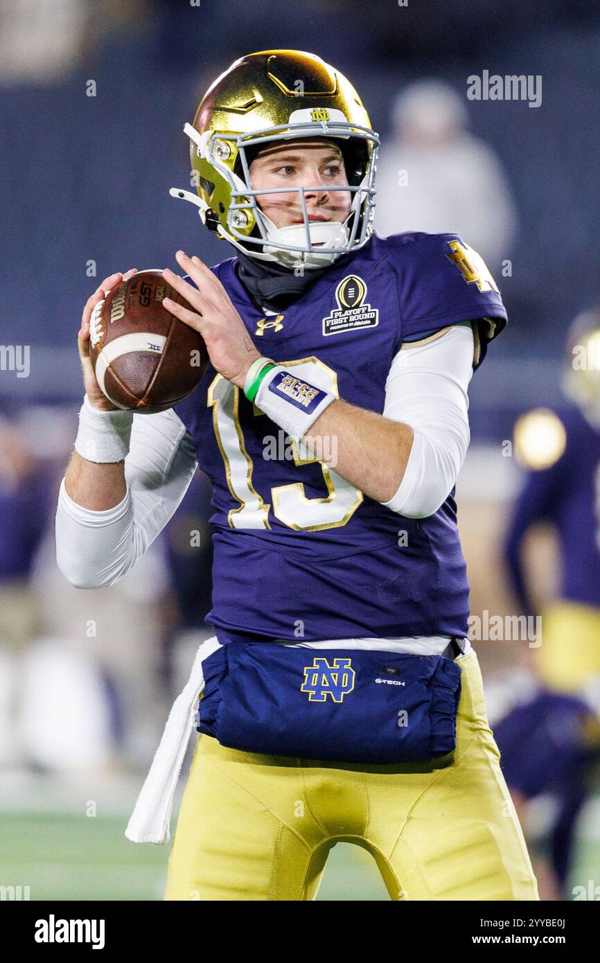 South Bend, Indiana, USA. 20th Dec, 2024. Notre Dame quarterback Riley Leonard (13) during ...