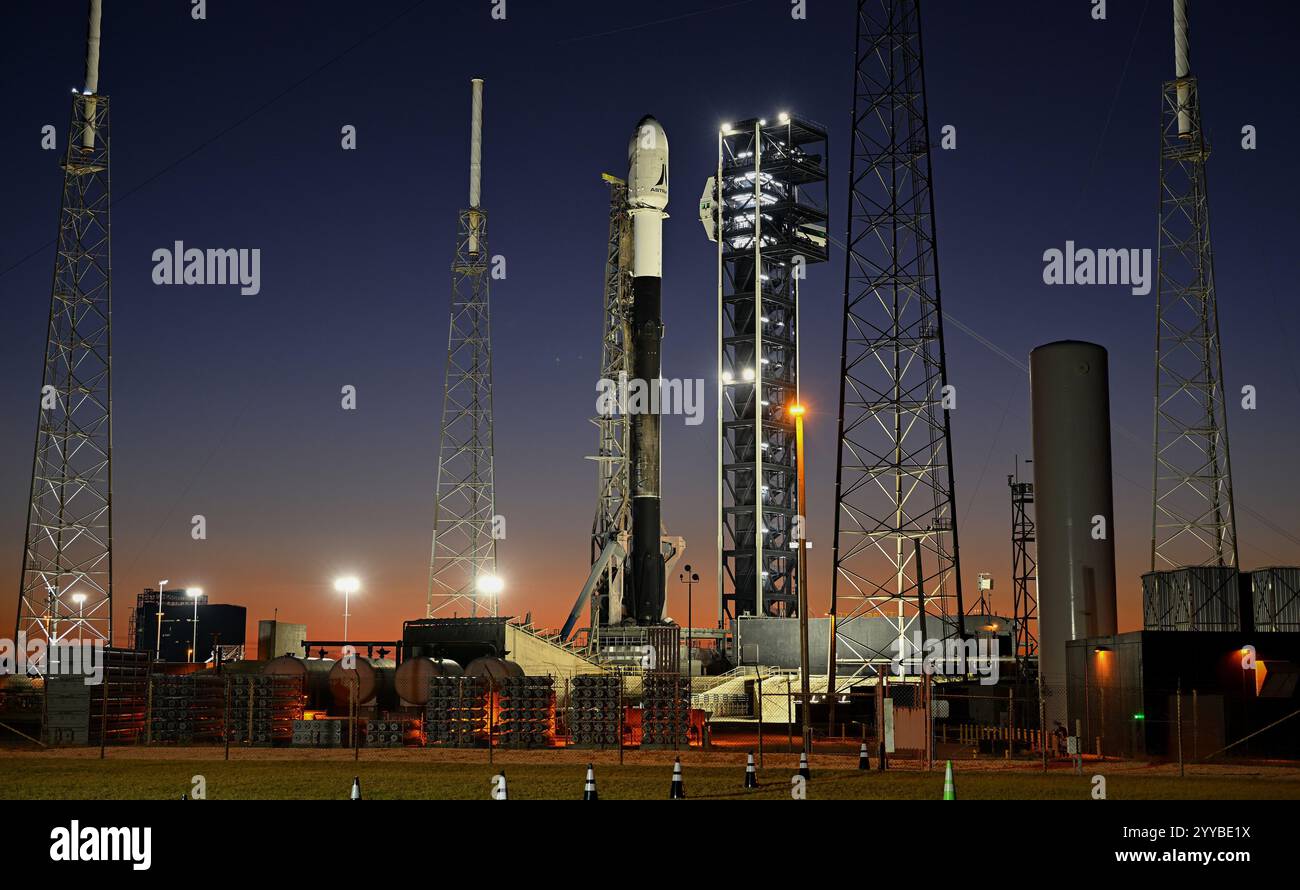 A SpaceX Falcon 9 rocket is prepared to launch four communications ...