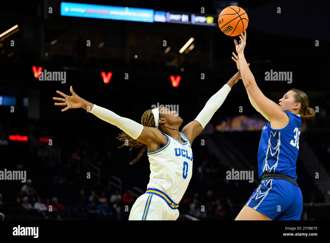 Creighton Bluejays guard Morgan Maly (30) attempts a basket against ...