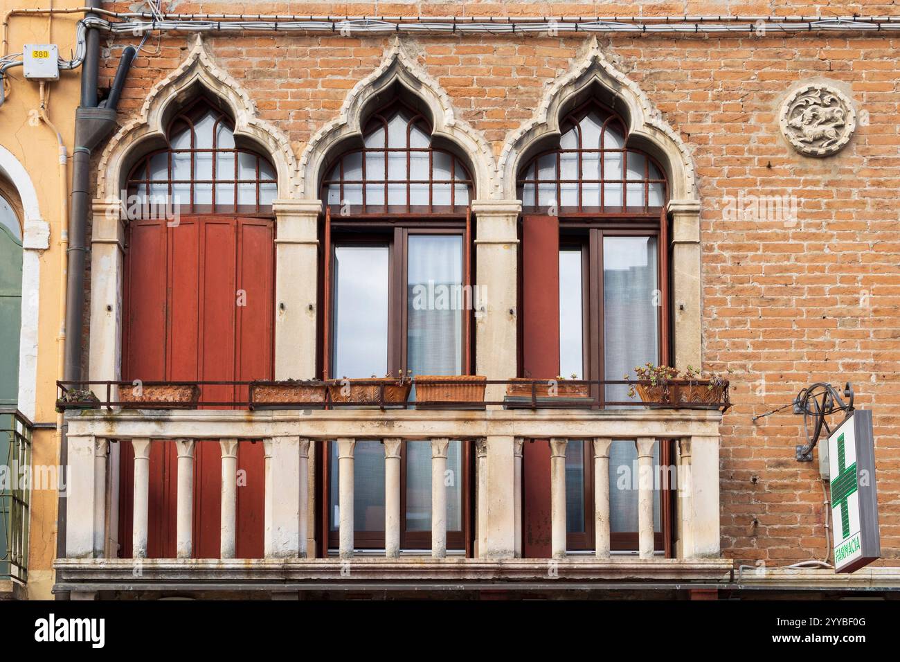 Italy, Venice. Castello district. Building detail with Gothic windows ...