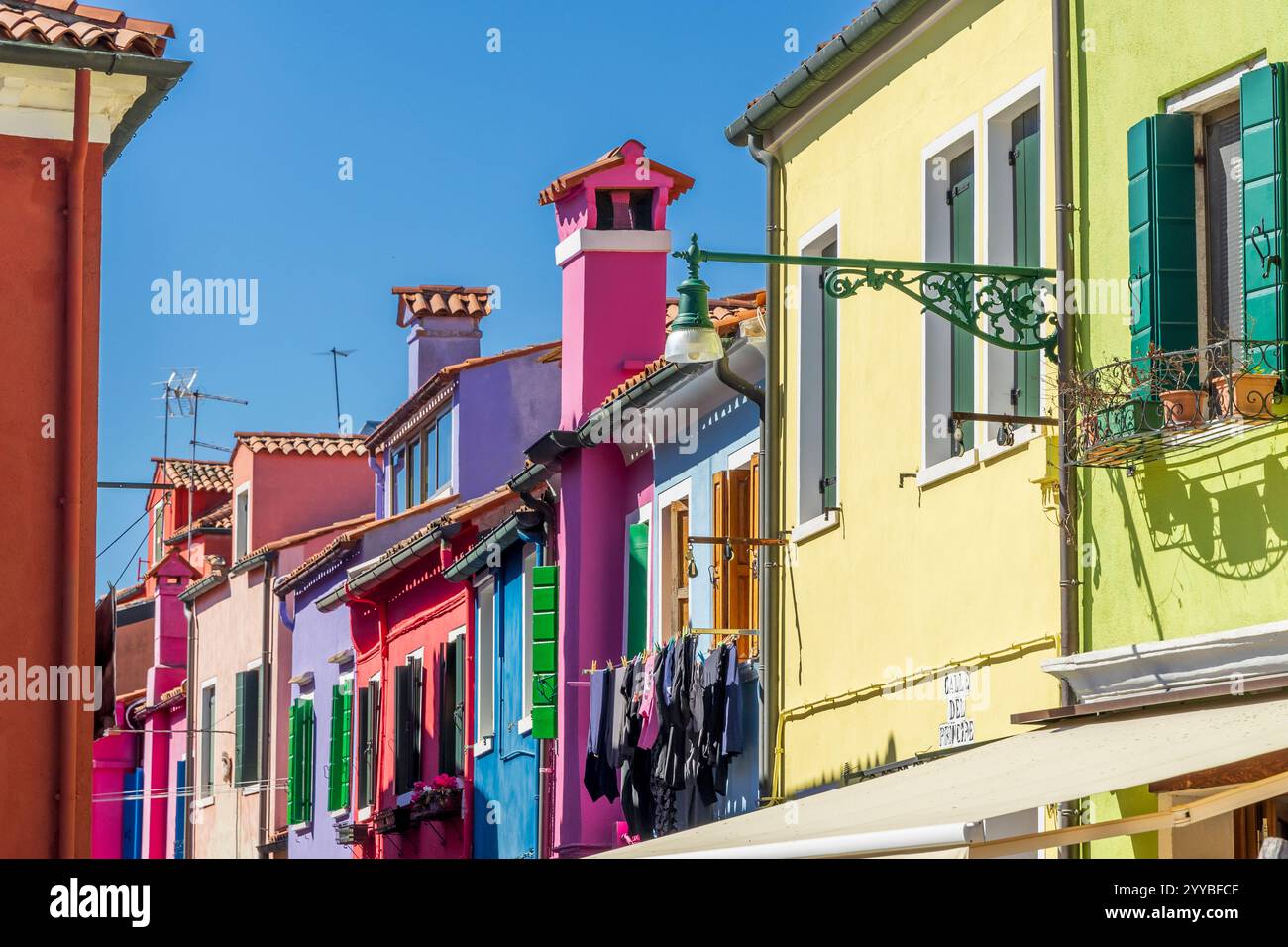 Italy, Burano. Colorful buildings the island is known for Stock Photo ...