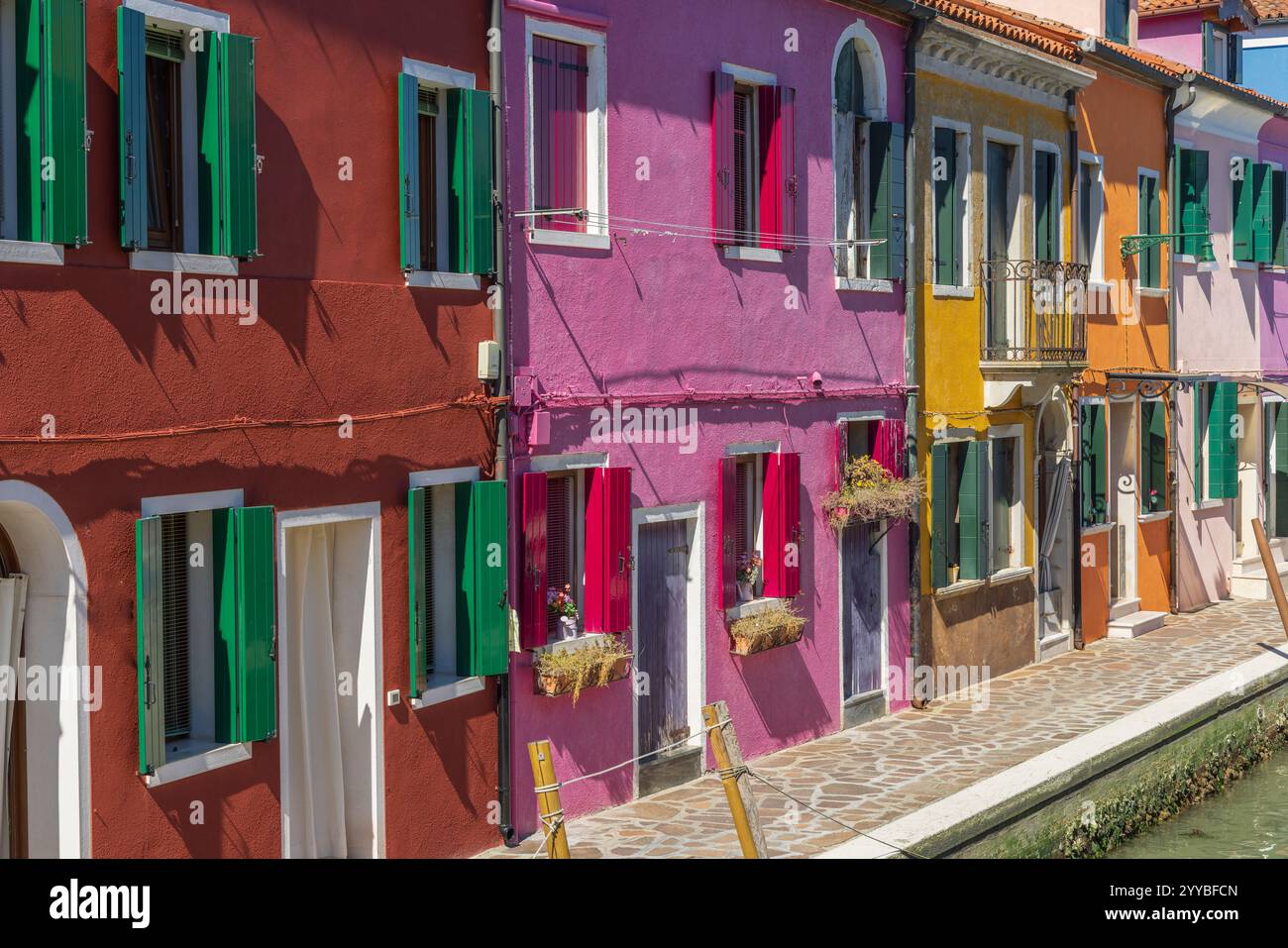 Italy, Burano. Colorful buildings the island is known for Stock Photo ...