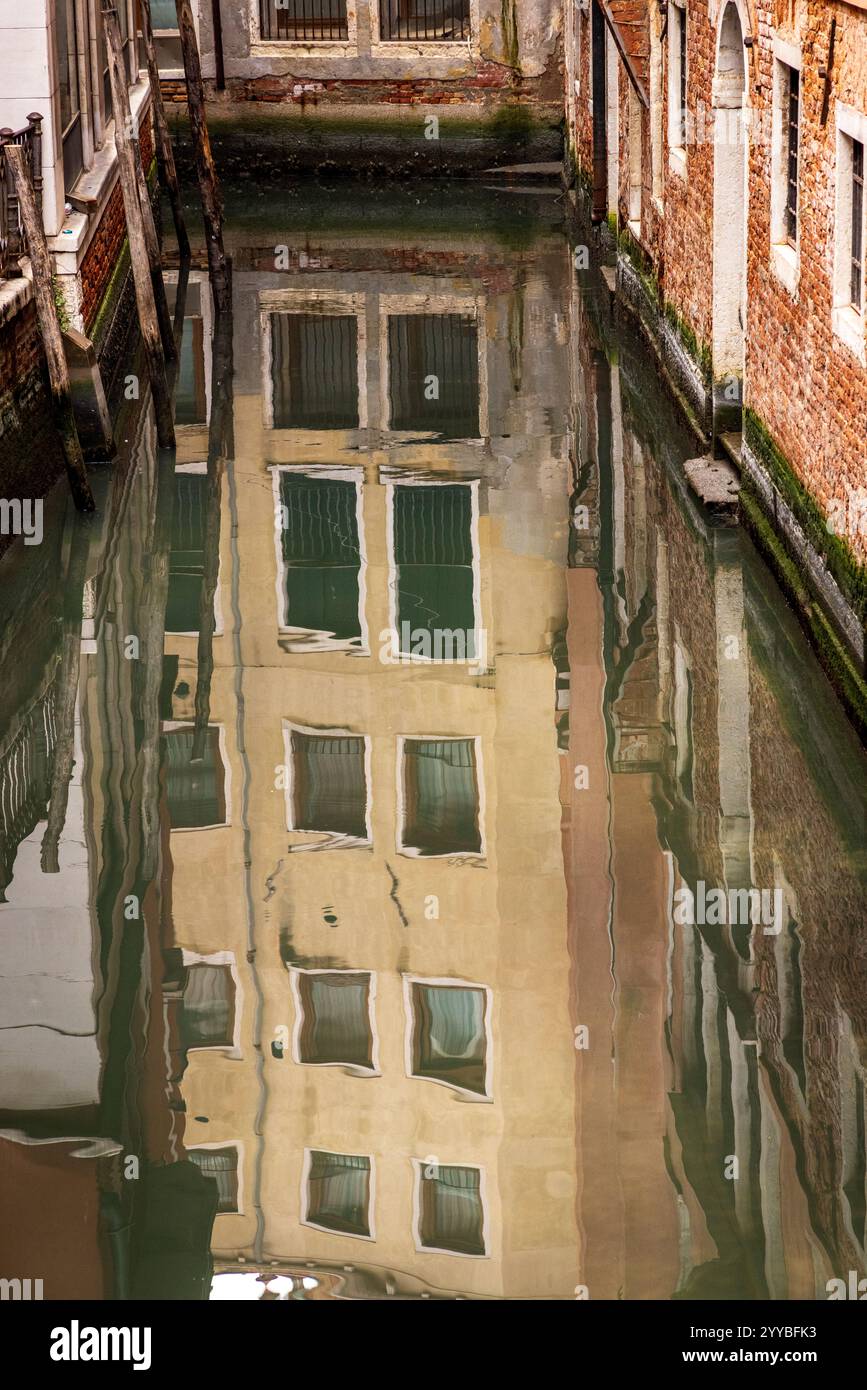 Italy, Venice. Small canal between buildings Stock Photo - Alamy