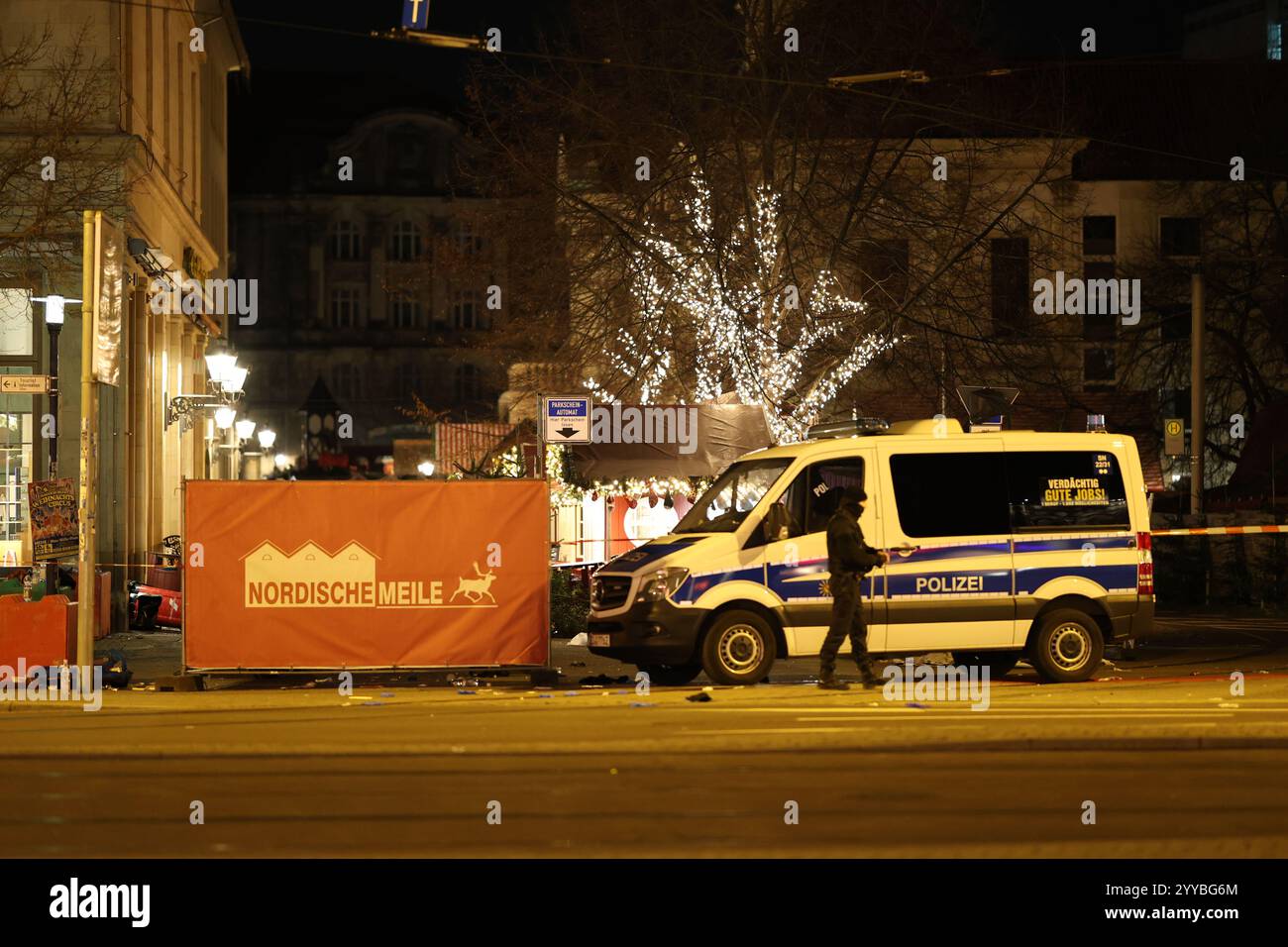 Magdeburg, Germany. 21st Dec, 2024. Police emergency vehicles in front ...