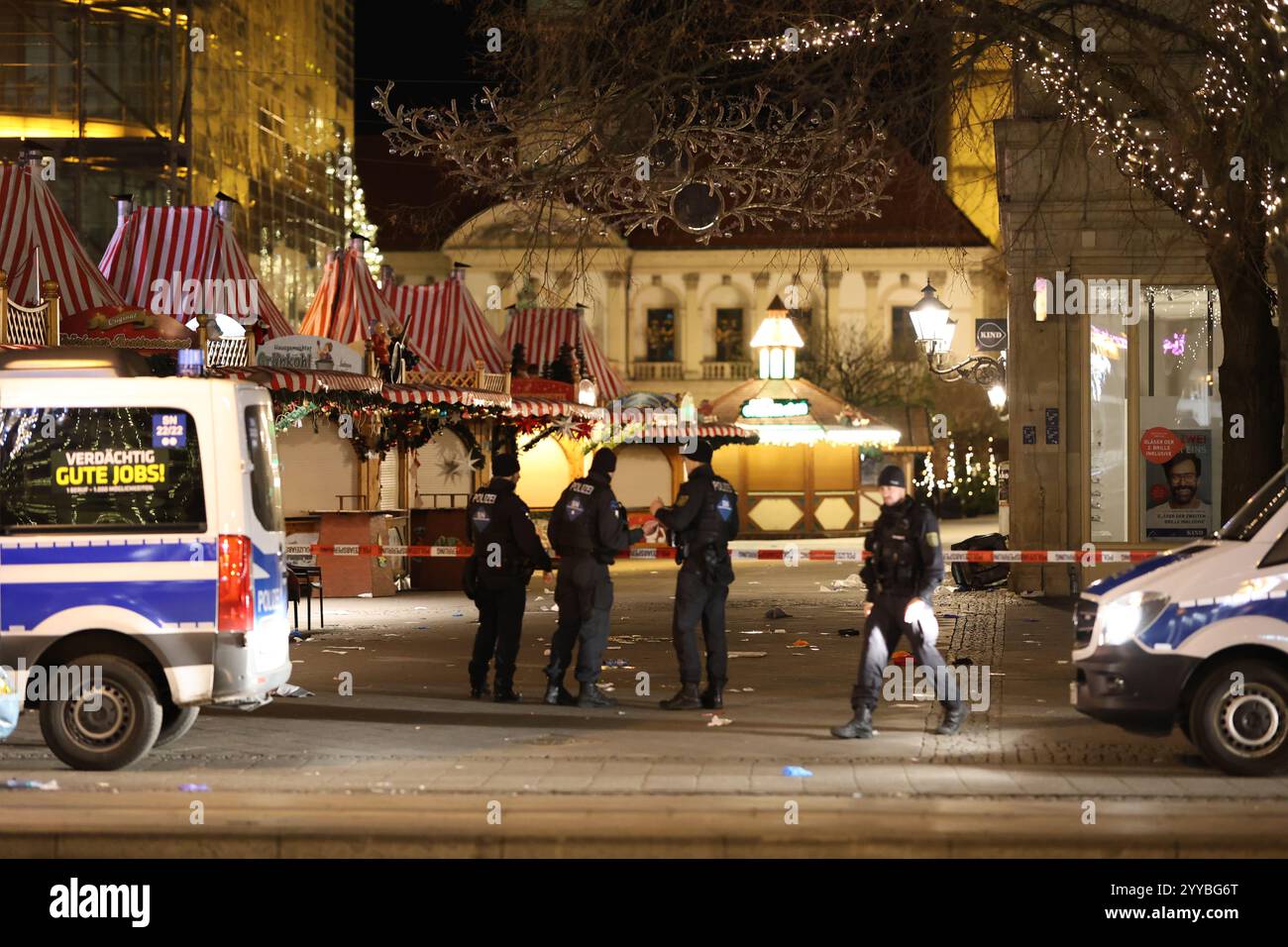 Magdeburg, Germany. 21st Dec, 2024. Police emergency vehicles in front ...