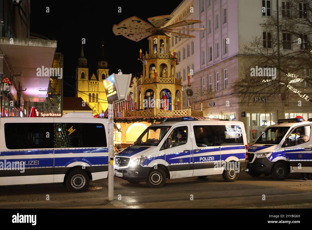 Magdeburg, Germany. 21st Dec, 2024. Police emergency vehicles in front ...