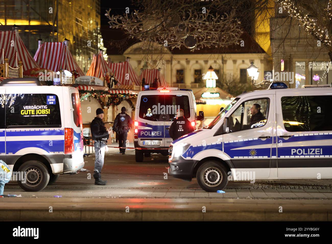 Magdeburg, Germany. 21st Dec, 2024. Police emergency vehicles at the ...