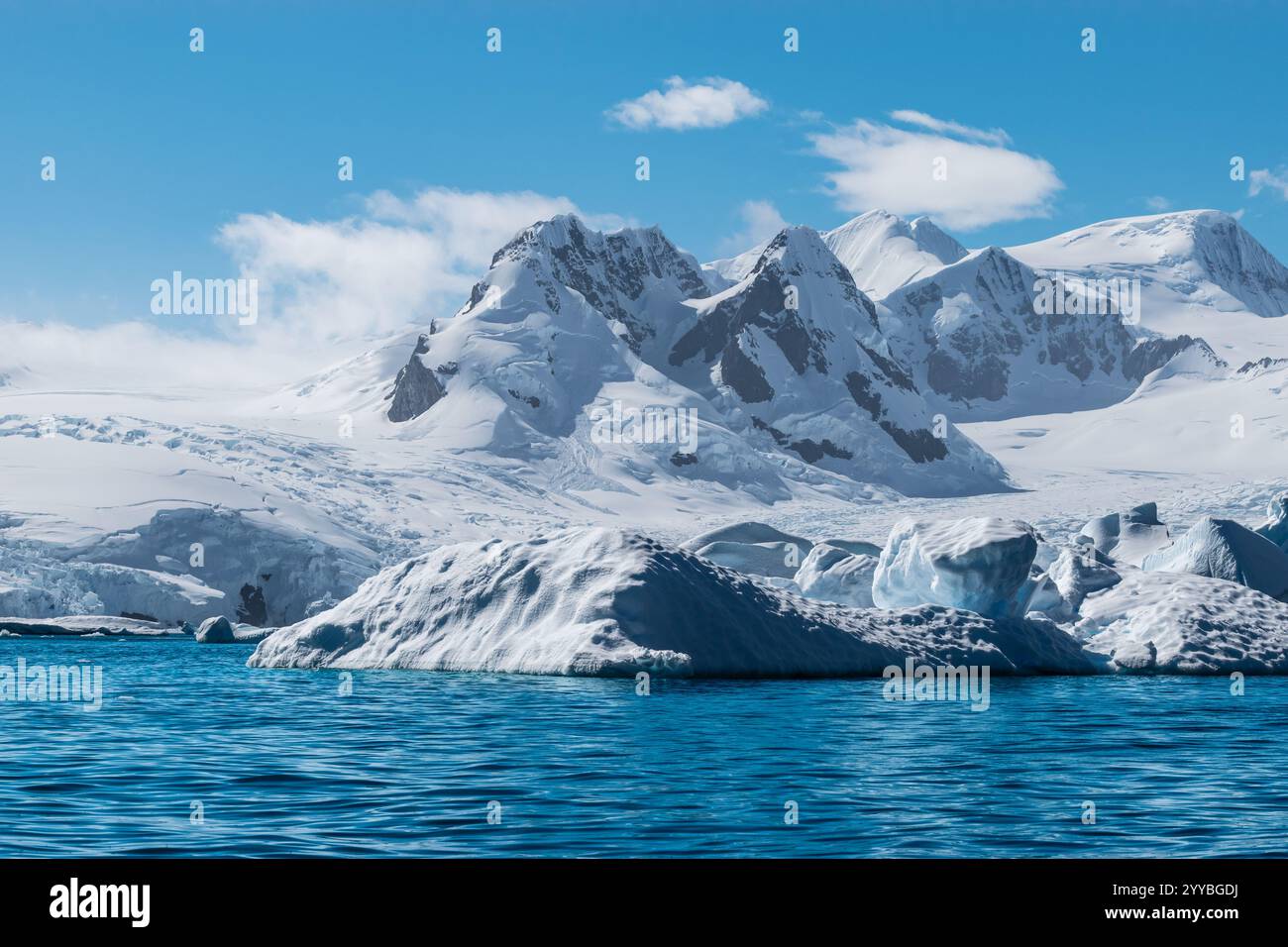 Iceberg in front of Snowy Mountain Peak, Cierva Cove, Antarctica Stock ...
