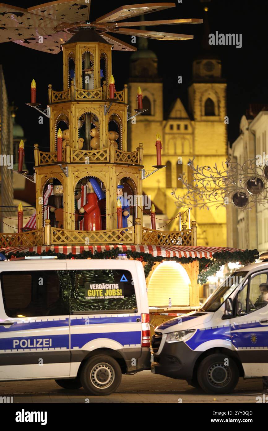 Magdeburg, Germany. 21st Dec, 2024. Police emergency vehicles in front ...