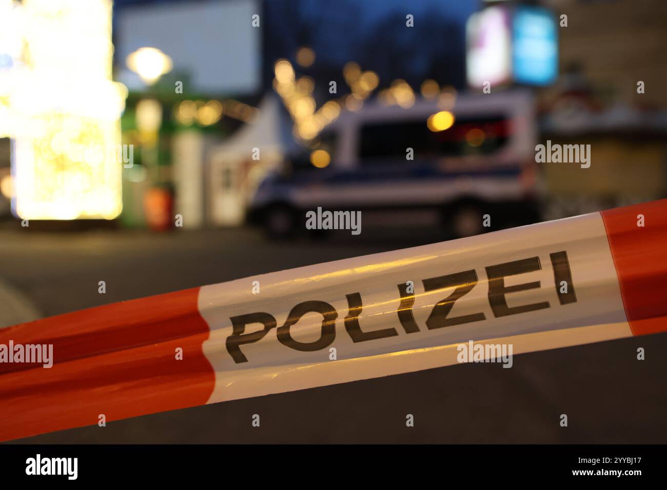 Magdeburg, Germany. 21st Dec, 2024. Police emergency vehicles cordon ...