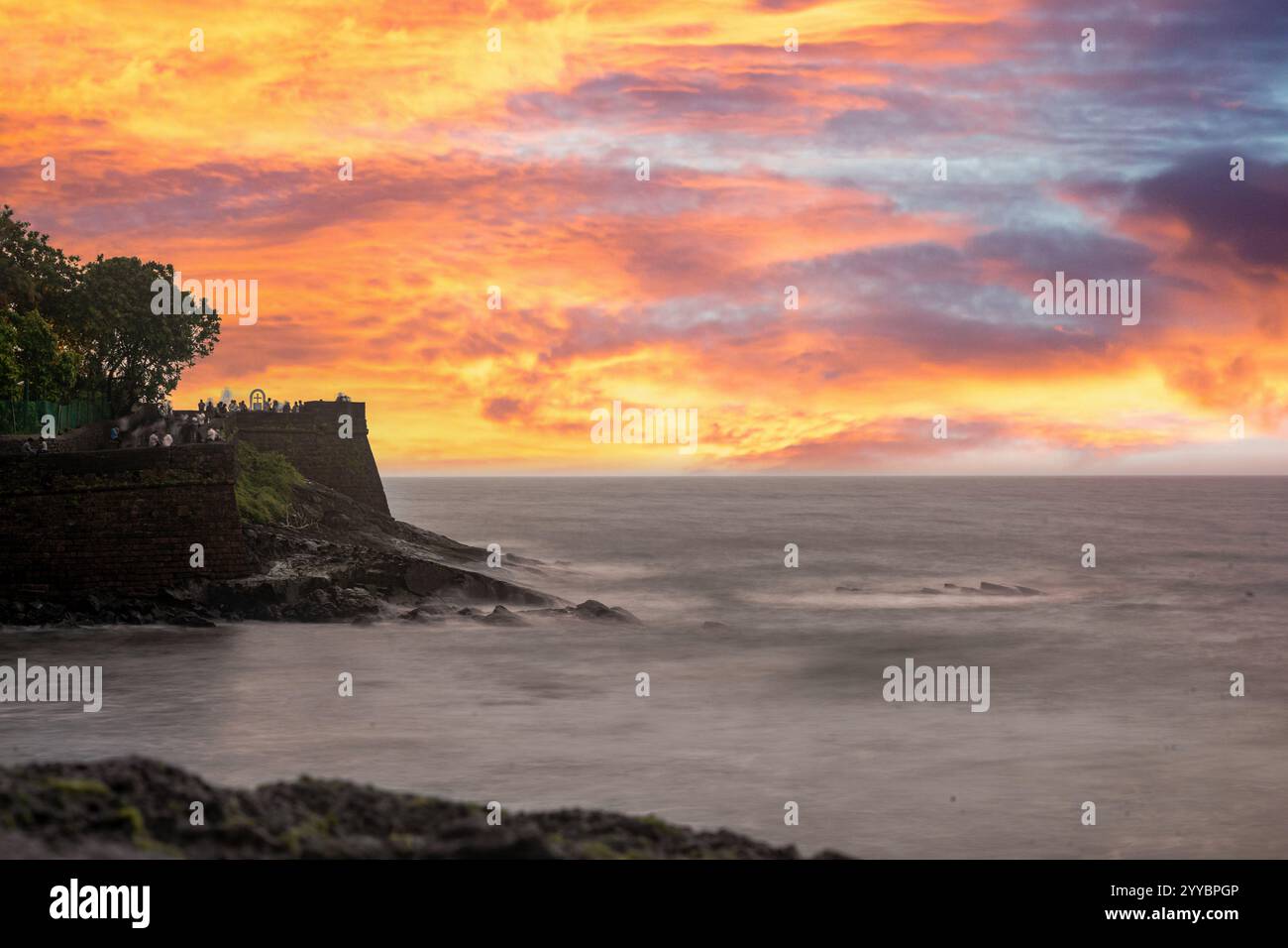 Tourists enjoying the view at Sinquerim Aguada fort with high monsoon ...