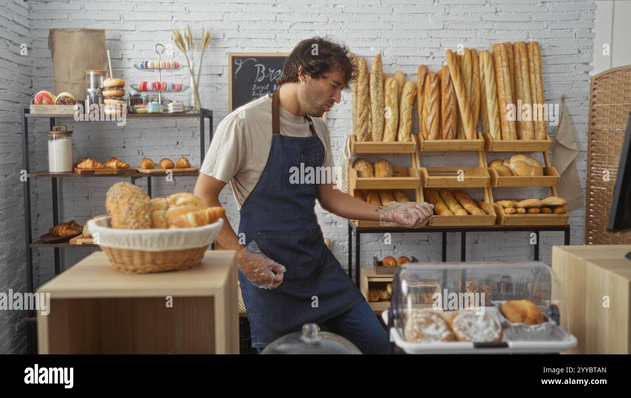 Hispanic young man making a guitar gesture in a bakery shop full of ...