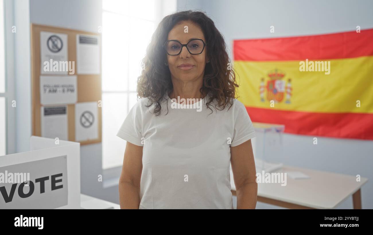 Woman standing indoors at an electoral college voting room with a ...