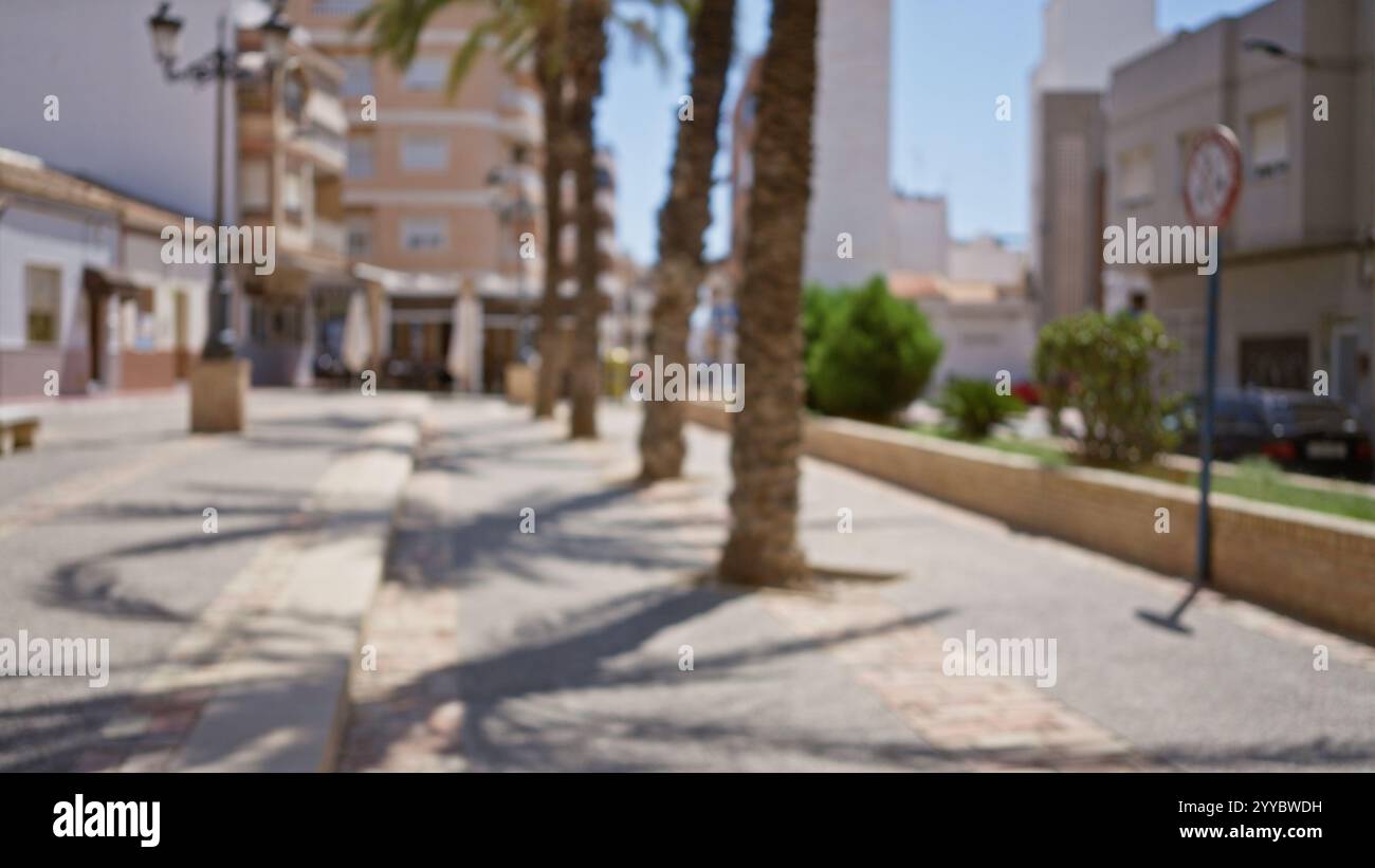 Outdoor blurred cityscape with palm trees, buildings, defocused shadows ...