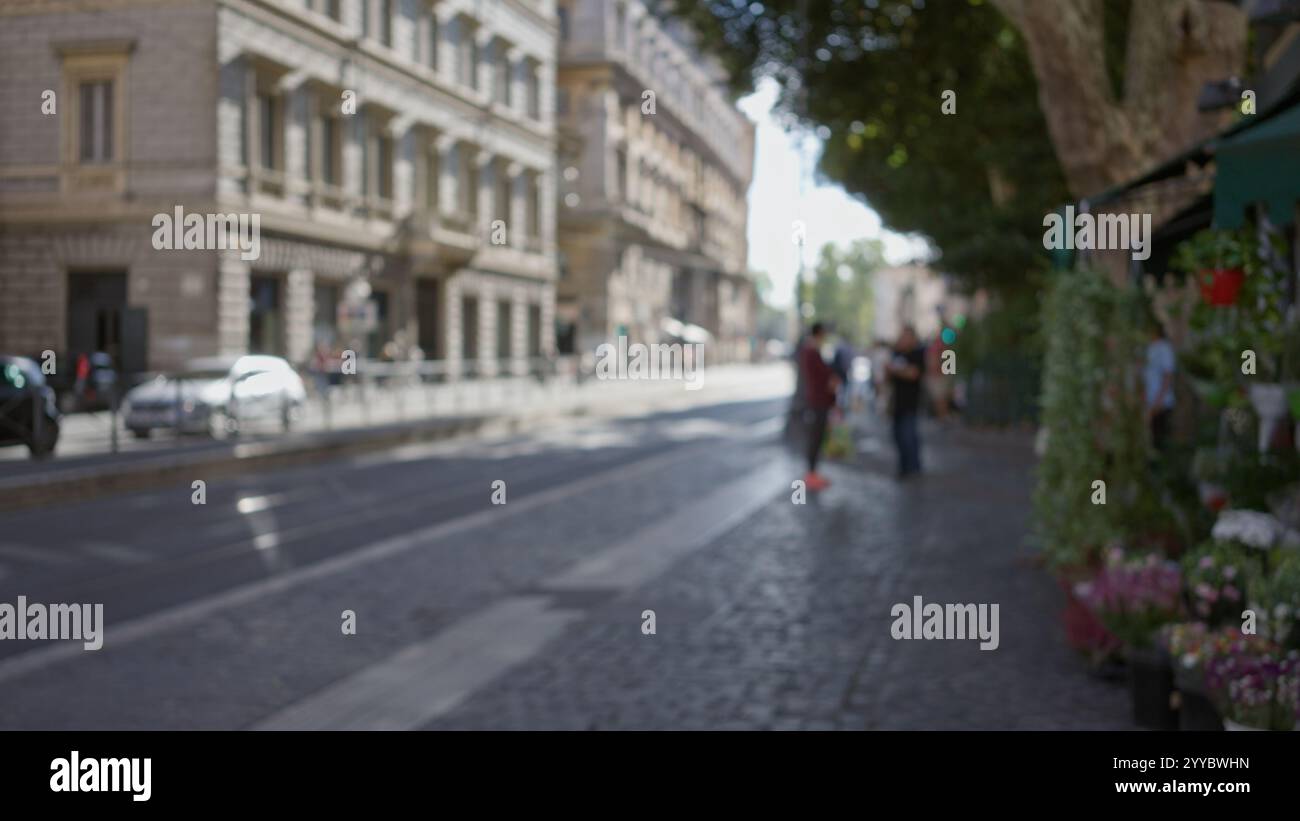 Blurred scene on a historic street in rome, italy, with indistinct ...