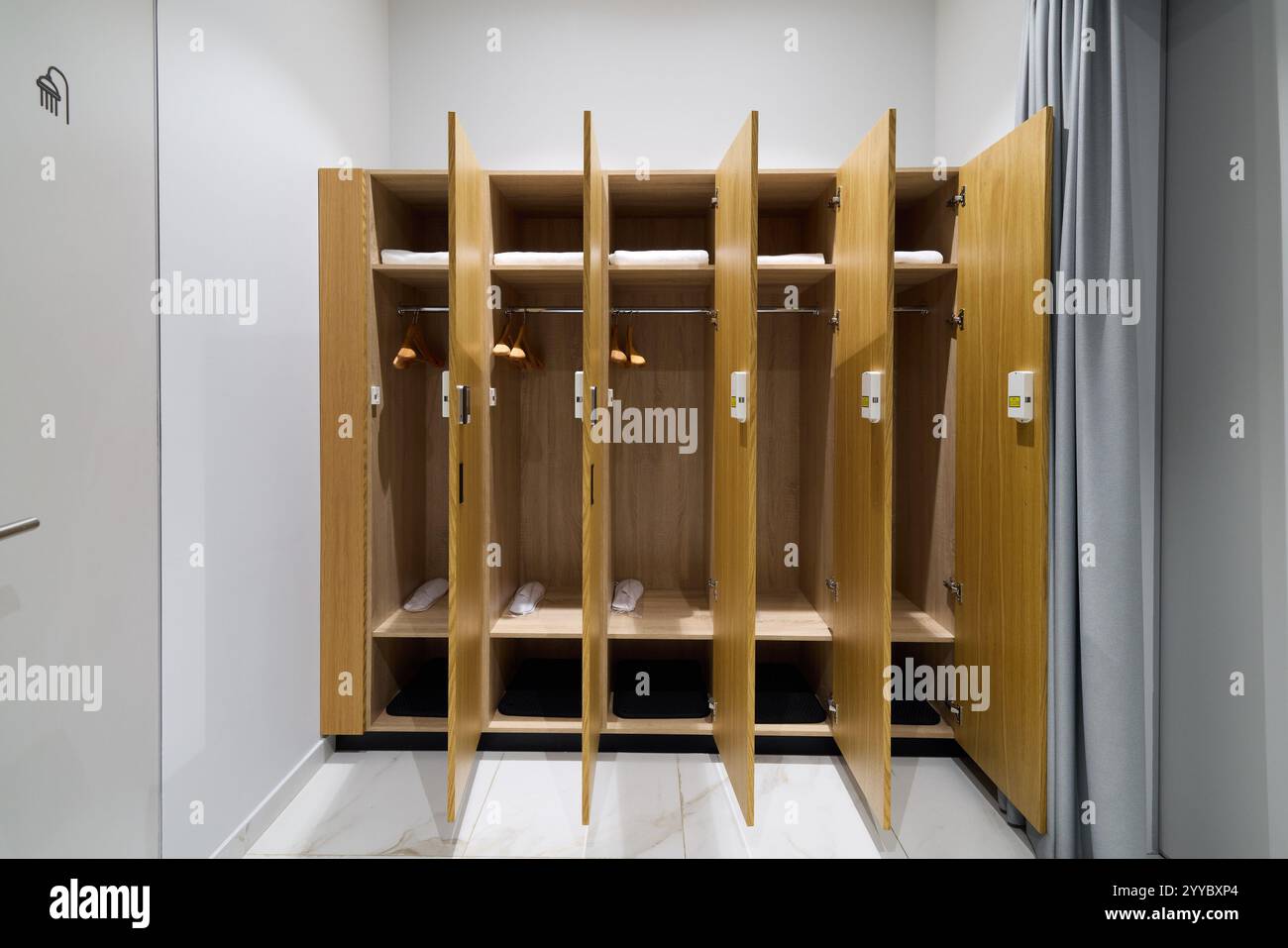 These stylish wooden lockers are wellplaced in a modern changing room ...