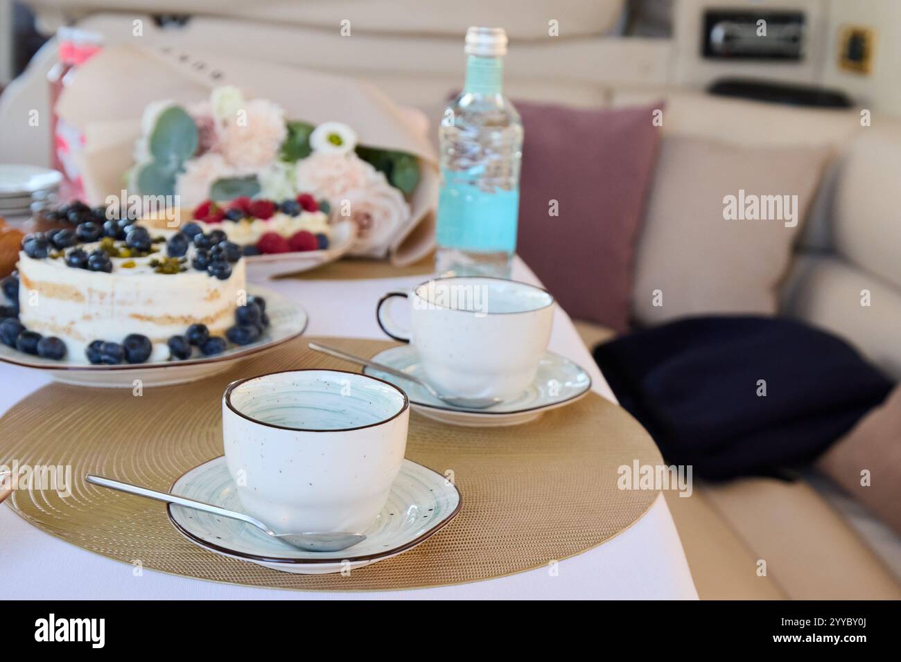 An Elegant Afternoon Tea Setup on a Luxurious Yacht with Delectable and ...