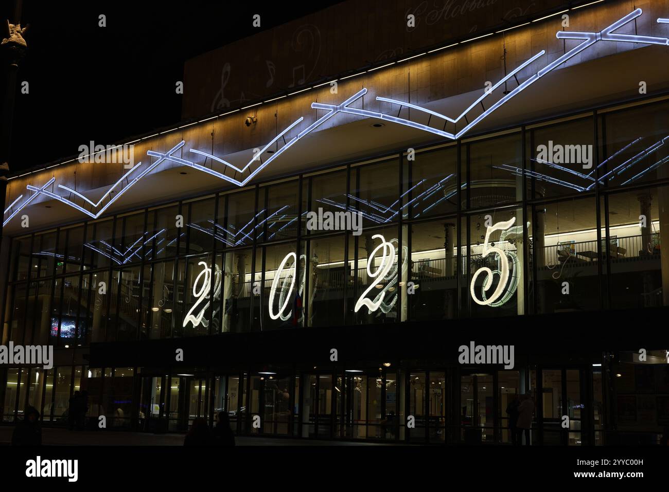 An Artistic and Illuminated 2025 Sign Glowing in the Night at a Vibrant ...