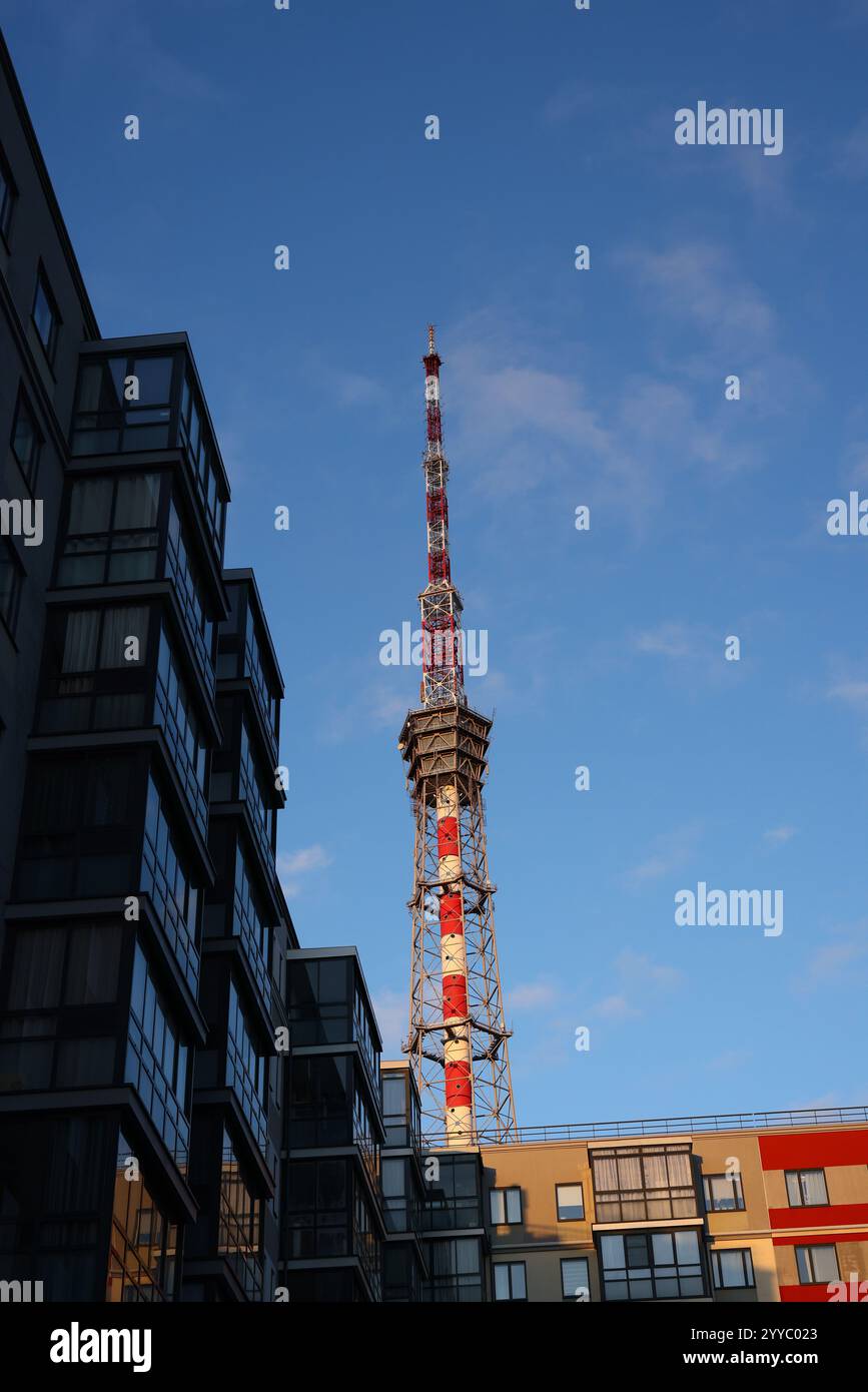 Urban skyline with a prominent communication tower in the cityscapes ...